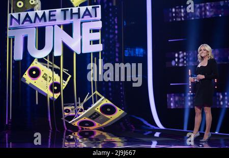 NAME THAT TUNE, host Jane Krakowski (center), with contestants, (Season ...