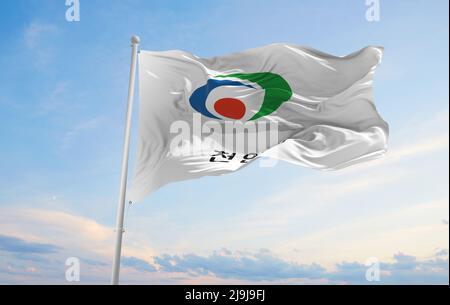official flag of Cheonan city, South Korea at cloudy sky background on ...