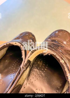 pair of old used sandals slippers isolated white background, dirty ...