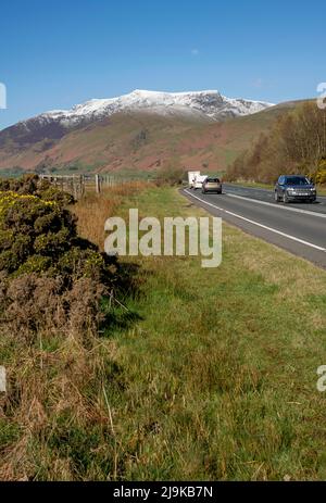 Traffic on the A66 to Keswick and snow topped Blencathra in spring late ...