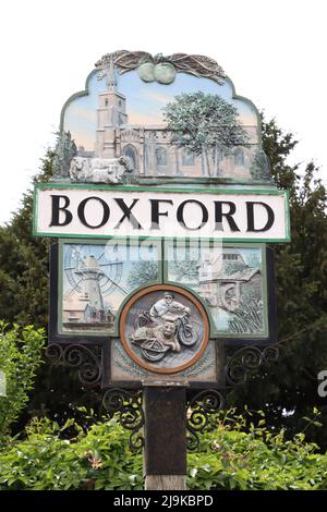 Village sign, Boxford, Suffolk, UK; pictorial metal sign depicting ...