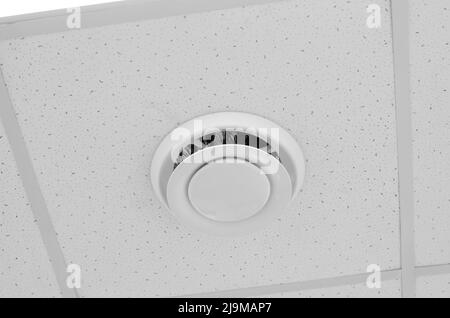 Round ventilation duct on the ceiling. Modern ventilation built into ...