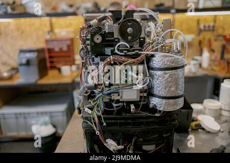 The interior of a defective espressomachine, ready to be repaired Stock ...