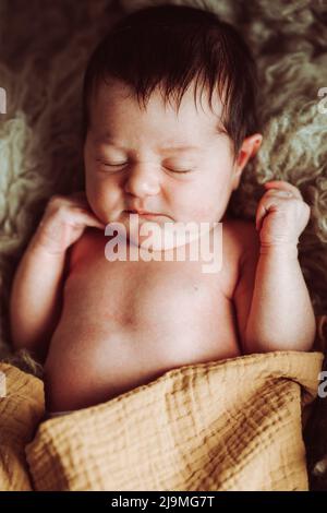 Newborn baby wrapped in soft blanket, closeup Stock Photo - Alamy
