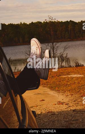 Beautiful young woman relaxing with leg massage at beauty spa Stock ...