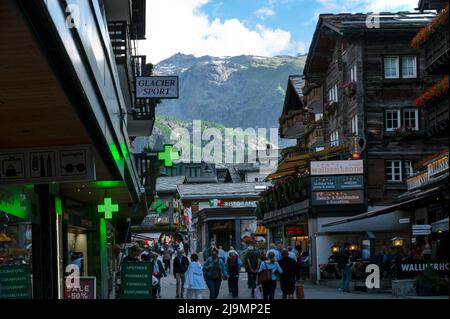 The picturesque main shopping street of Zermatt with Restaurants ,local ...