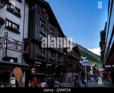 The picturesque main shopping street of Zermatt with Restaurants ,local ...
