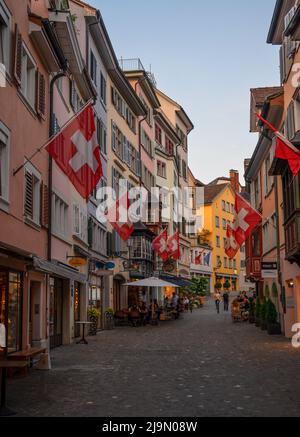 Picturesque view of Augustinergasse in Zurich with colorful medieval ...