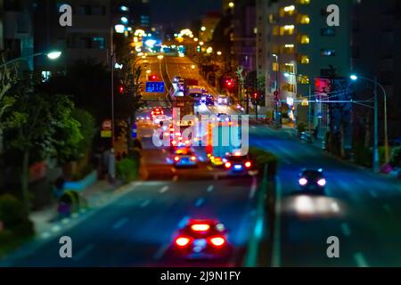 A night miniature traffic jam at the downtown street in Tokyo Stock ...