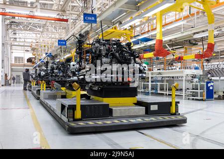 Photo of car bodies are on assembly line. Factory for production of ...