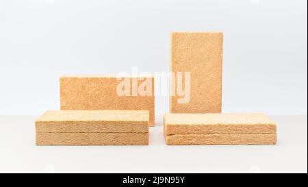 wooden fibers thermal insulation blocks on a white background - energy ...