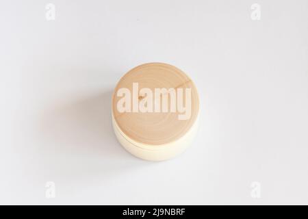 Round wooden casket mock up on white background Stock Photo - Alamy