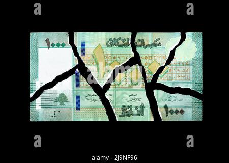 Ripped one thousand Lebanese pounds bill, currency of Lebanon Stock ...
