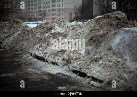 A large pile of cleared snow in the Edgewood Towne Centre shopping ...