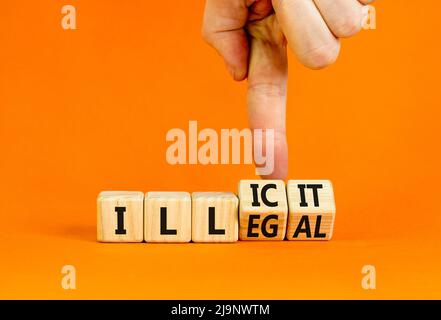 Illegal or illicit symbol. Businessman turns wooden cubes and changes ...