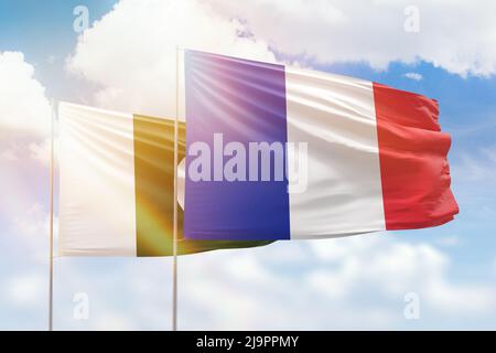 Pakistan and France flags waving together on blue cloudy sky, two ...