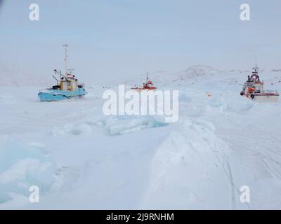 The harbor of Ikerasak near Uummannaq during winter in northern West ...