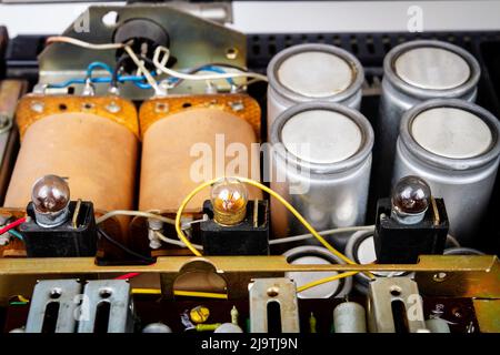 Inside view of turntable with amplifier, capacitors, coils and other ...