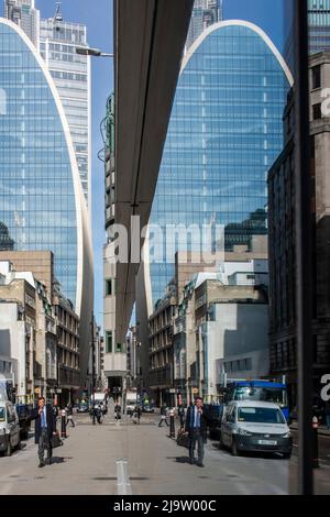 Curved facade of 70 St Mary Axe (Can of Ham) along Bevis Marks Street ...