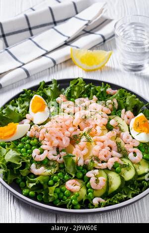 Katkarapusalaatti salad of pink cocktail shrimps with lettuce, green ...