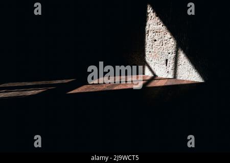 Light and shadows falling on textured wall Stock Photo - Alamy