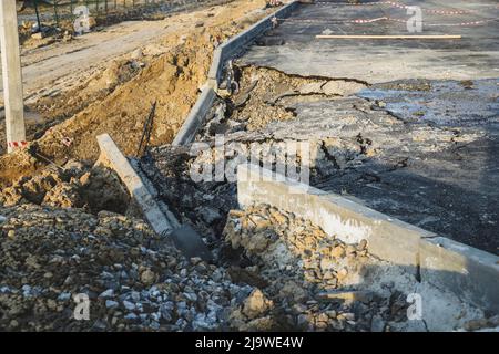 Asphalt swelling close-up. Pothole and pit on road Stock Photo - Alamy