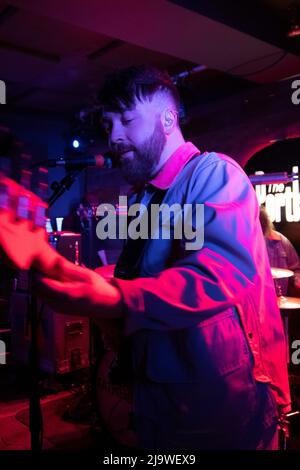 Mark Strain of Fatherson playing bass guitar at the Portland Arms ...