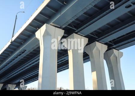 Four road bridge supports close-up. Engineering and architecture ...