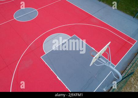 drone aerial view of a red and gray basketball court Stock Photo - Alamy