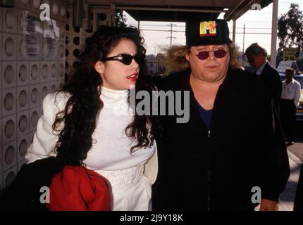 Sam Kinison and Malika Souiri 1992 Credit: Ralph Dominguez/MediaPunch ...