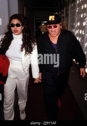 Sam Kinison and Malika Souiri 1992 Credit: Ralph Dominguez/MediaPunch ...