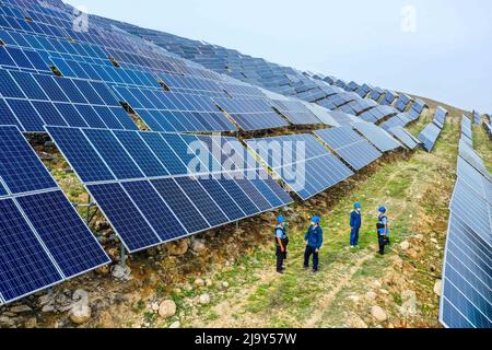 YILI, CHINA - MAY 24, 2022 - Police officers conduct safety checks at a ...