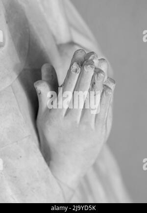 Man hands praying ancient sculpture Stock Photo - Alamy