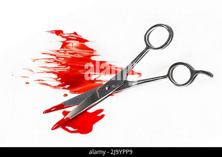 shear scissors with blood on white background Stock Photo - Alamy