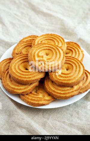 Homemade Sprits Biscuits on a Plate, side view Stock Photo - Alamy