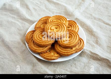 Homemade Sprits Biscuits on a Plate, side view Stock Photo - Alamy