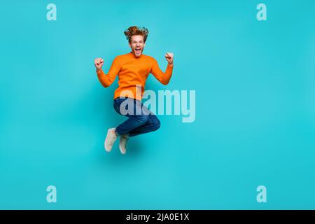 Photo of impressed lucky guy dressed purple sweater dark eyewear rising ...