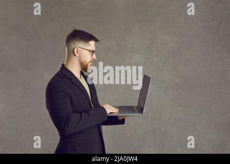 Concentrated businessman or stock broker over forex chart projection ...