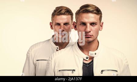 Find differences. twins brother in white. male beauty and fashion ...