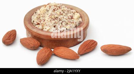 Crushed with peeled almond over white background Stock Photo - Alamy