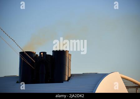 Smoking chimney of an ordinary cruise ship Stock Photo - Alamy