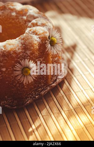 Cupcake decorated chamomile flower In the rustic style. Authentic photo ...