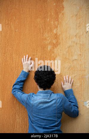 View of woman's hands touching the wall Stock Photo - Alamy