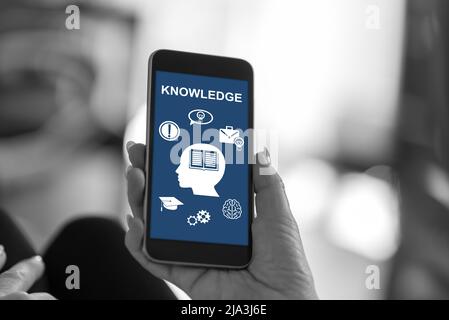Smartphone screen displaying a knowledge concept Stock Photo - Alamy