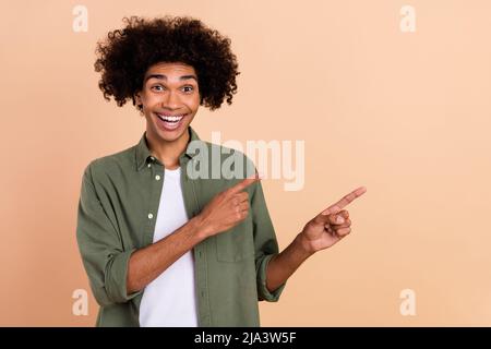 Portrait of attractive amazed cheerful wavy-haired woman having fun ...
