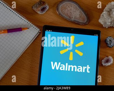 In this photo illustration, the Walmart, Inc. logo seen displayed on a ...