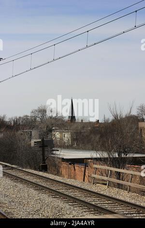 Typical common railroad tracks crossing the plains on a bright sunny ...