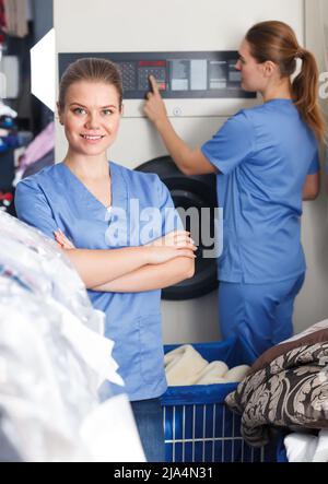 Portrait of female laundry worker during daily work Stock Photo - Alamy