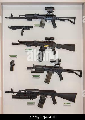 Assault rifles displayed in IDEX 2011 Military exibition Stock Photo ...