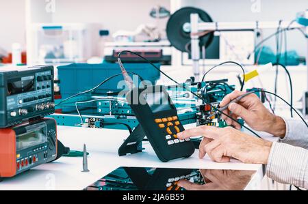 Assembling and adjust the electronics instrument for precision physical ...
